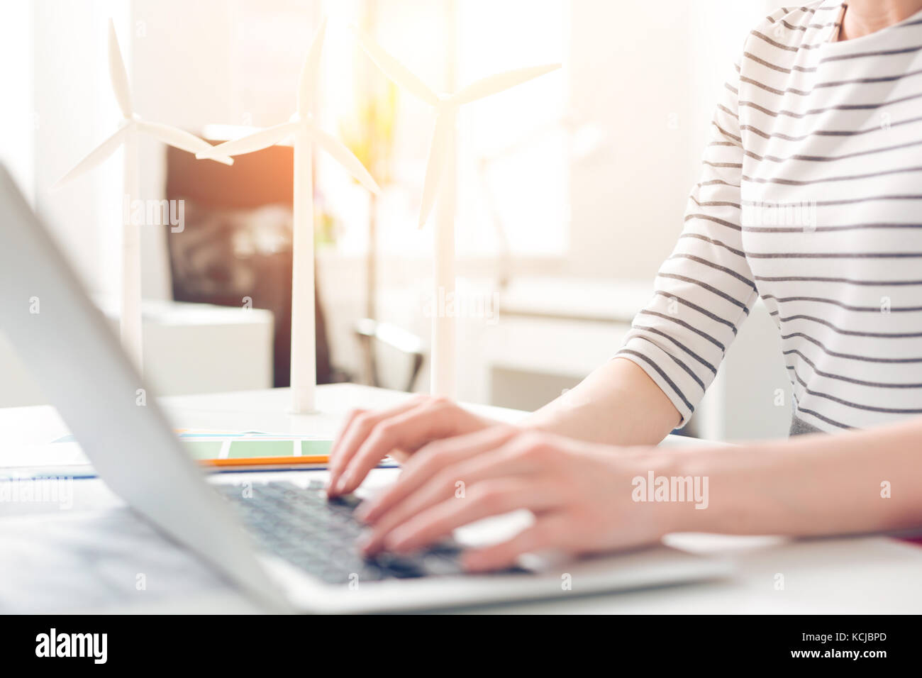 Nice pleasant woman typing hi-res stock photography and images - Alamy