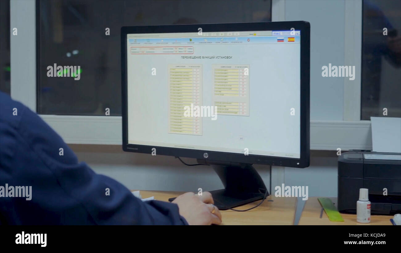 mechanical technician operative of cnc milling cutting machine working ...