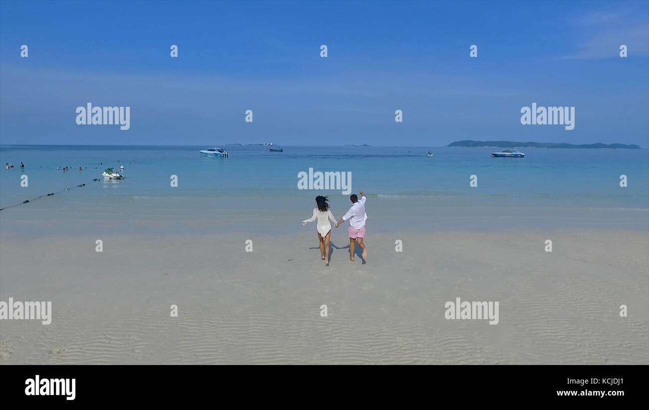 Couple going swim hi-res stock photography and images - Alamy