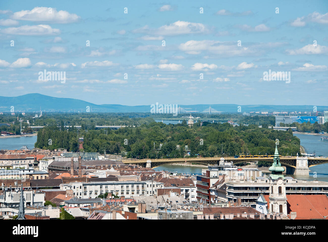 An aerial cityscape view over Budapest showing Margaret Island on a ...