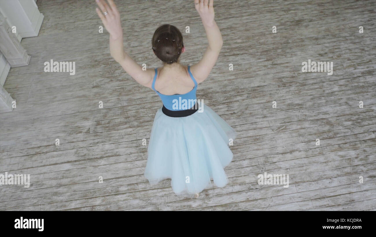 Beautiful Girl Dancer Performs Elements Of Classical Ballet In The Loft