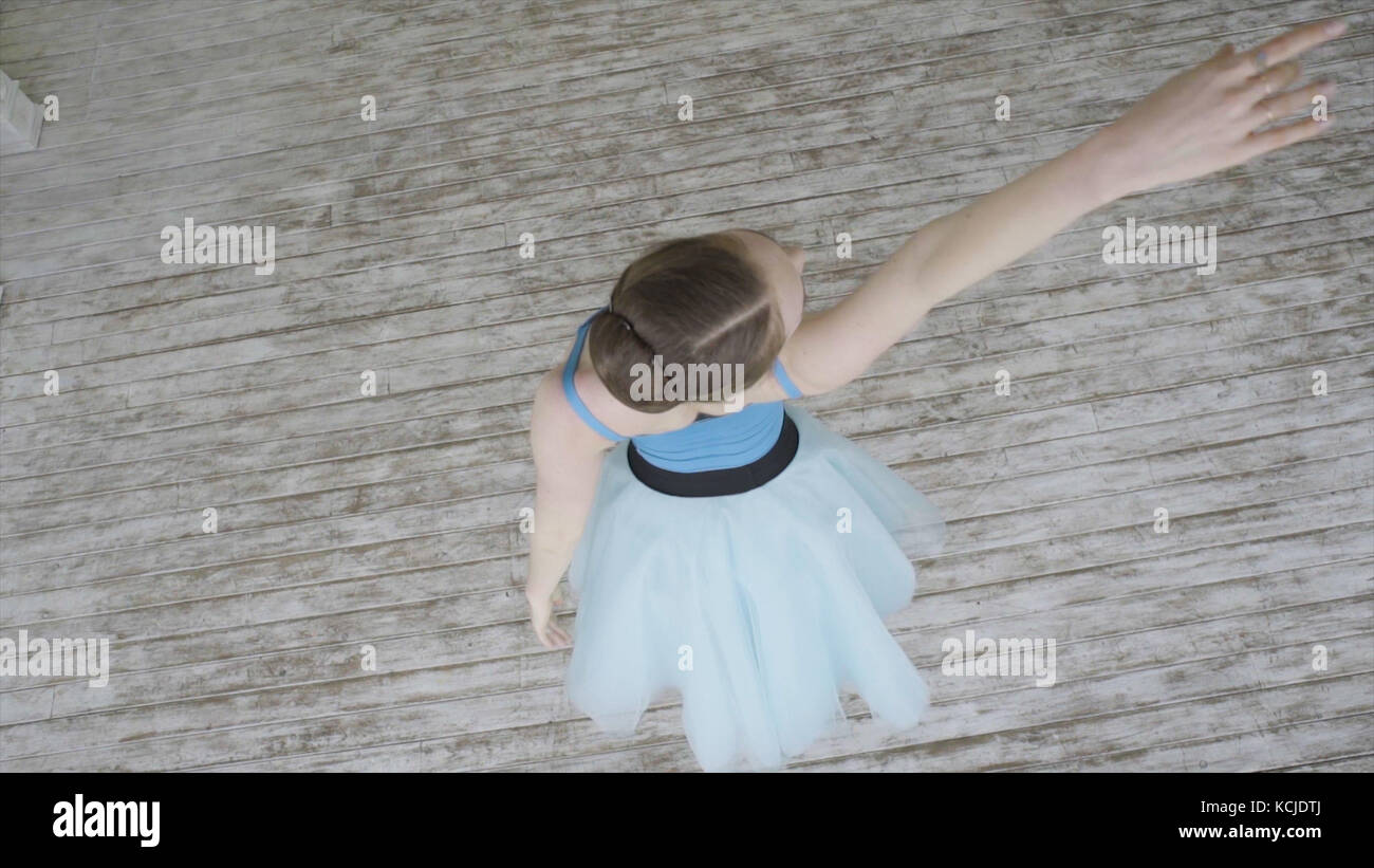 Beautiful Girl Dancer Performs Elements Of Classical Ballet In The Loft