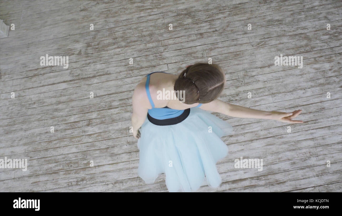 Beautiful Girl Dancer Performs Elements Of Classical Ballet In The Loft