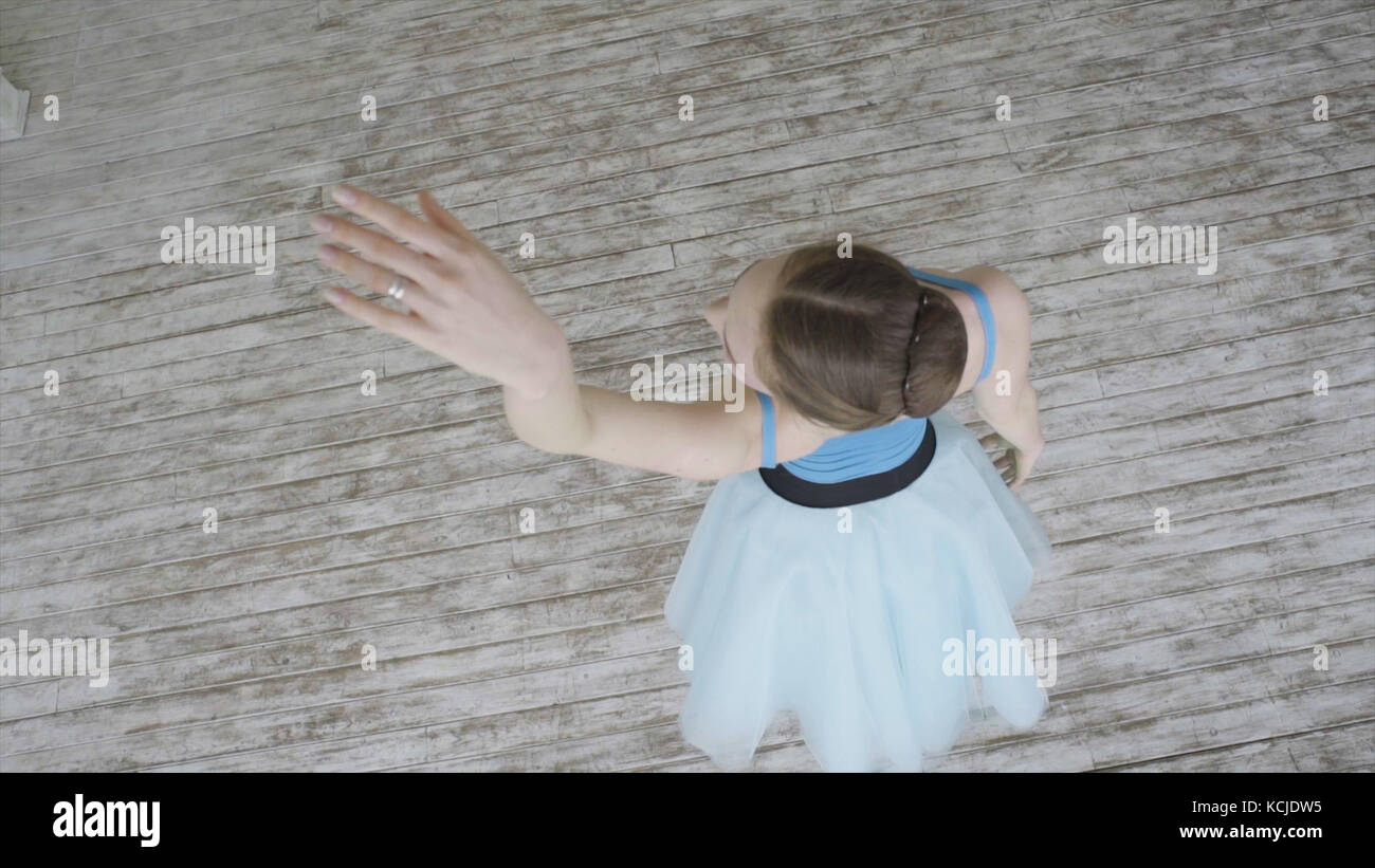 Beautiful Girl Dancer Performs Elements Of Classical Ballet In The Loft