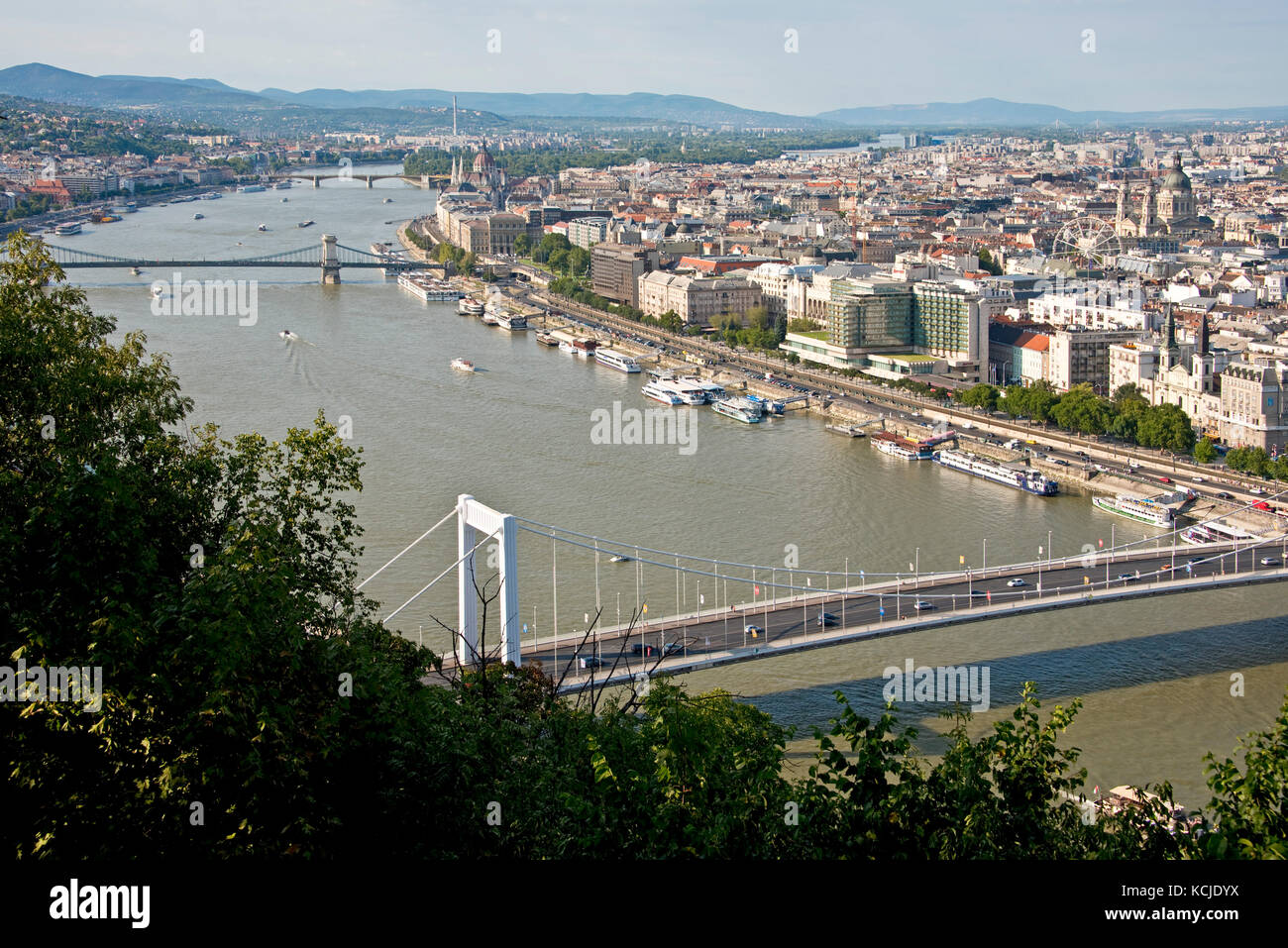 An aerial cityscape view of the Danube river in Budapest on a sunny day ...