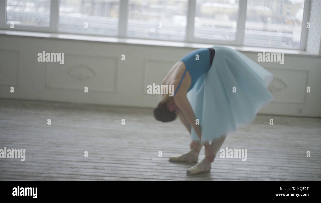 Professional ballet dancer have a rest. Tired ballerina restores ...