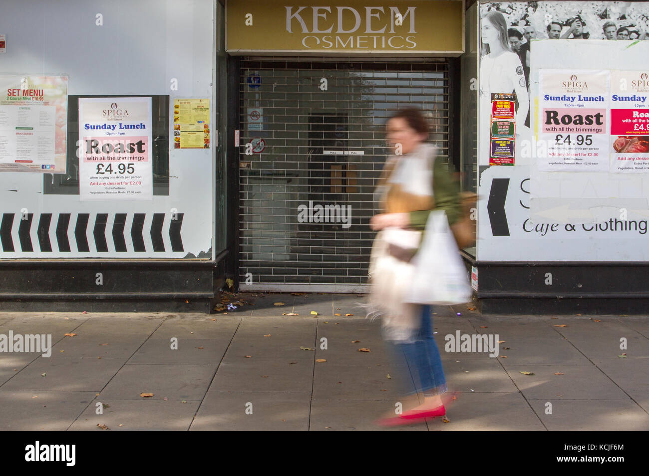 Out of focus figures passing, Businesses in decline, Prime Location ...