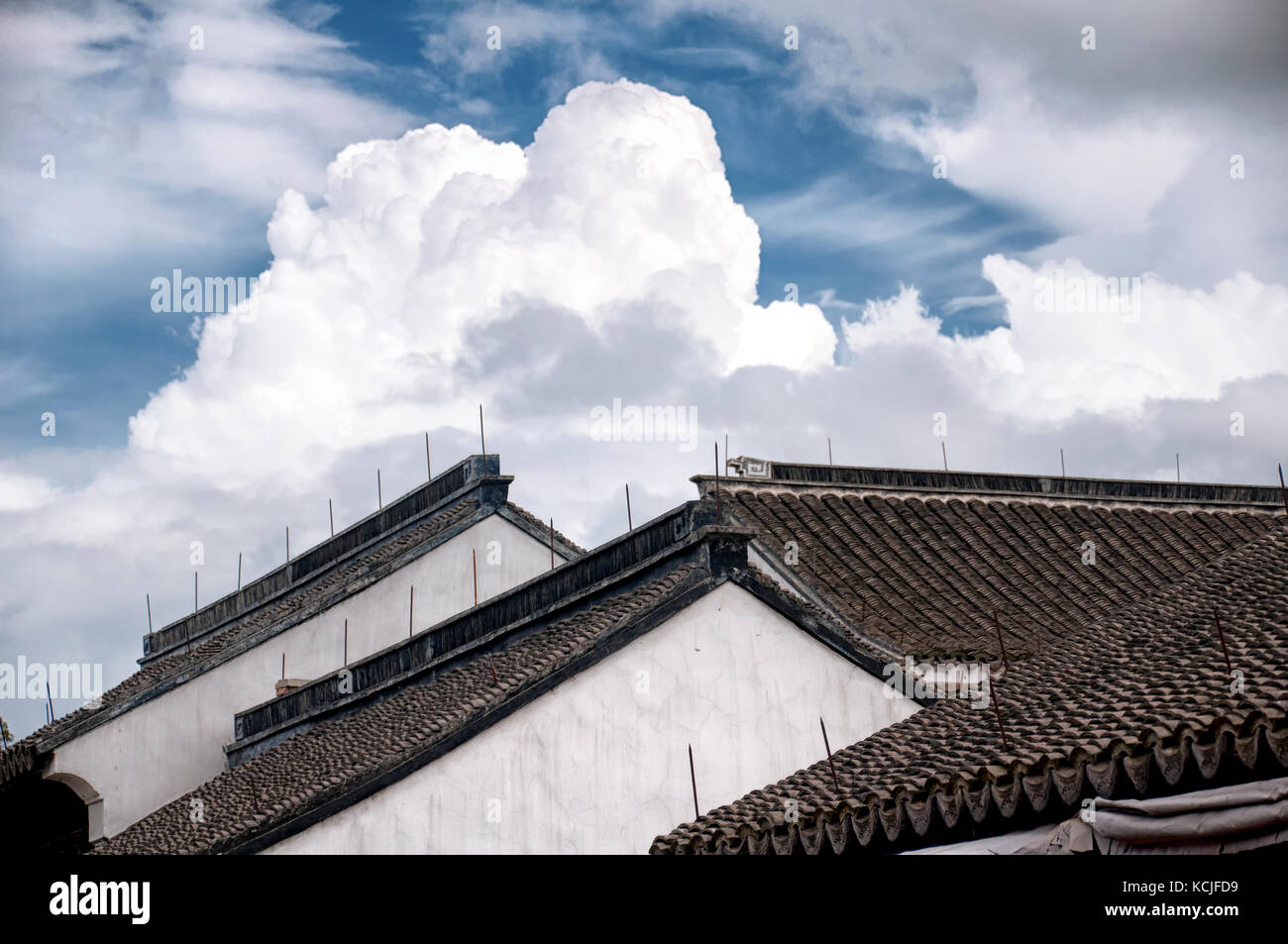 White puffy clouds over chinese style buildings in Xitang town in ...