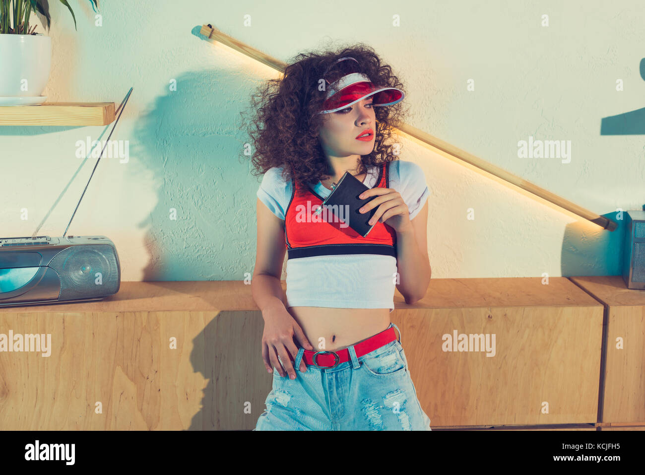 fashionable woman with hip flask Stock Photo - Alamy