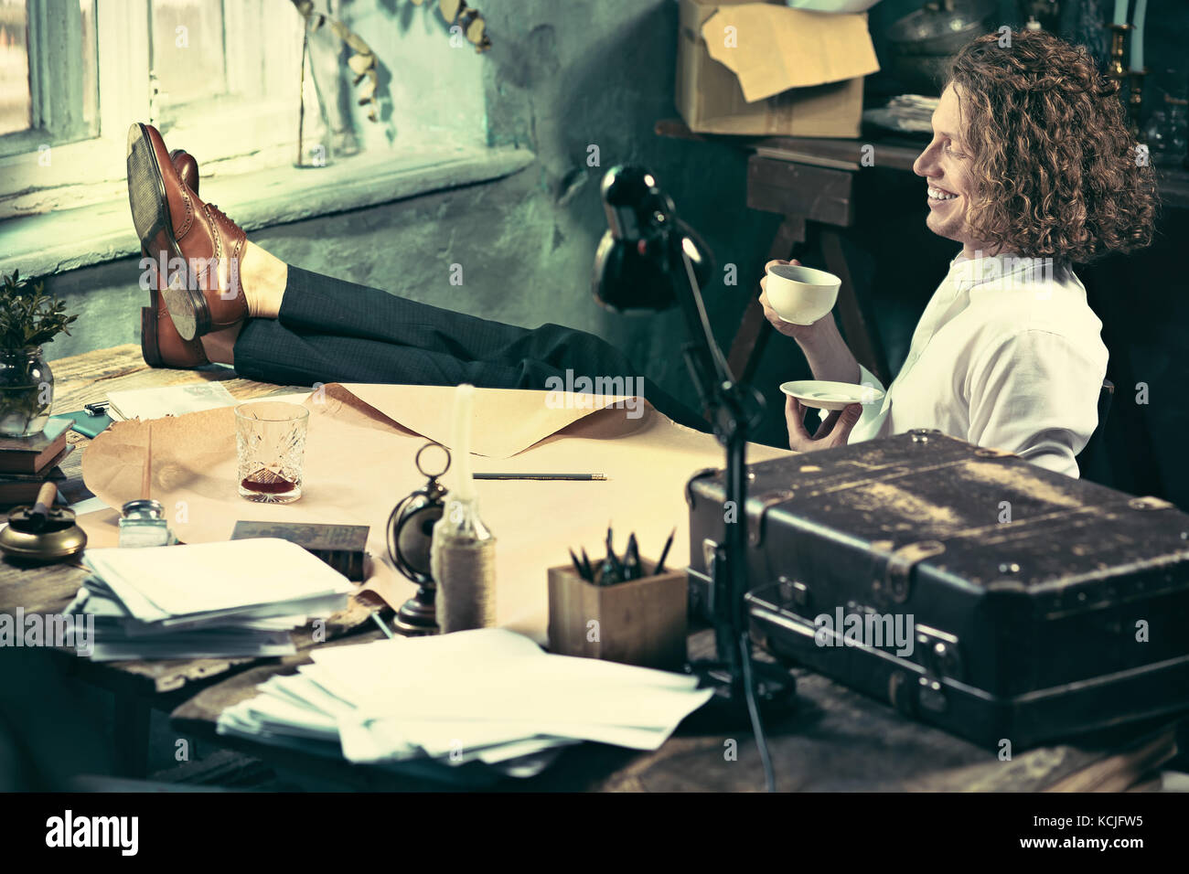 Architect working on drawing table in office Stock Photo - Alamy