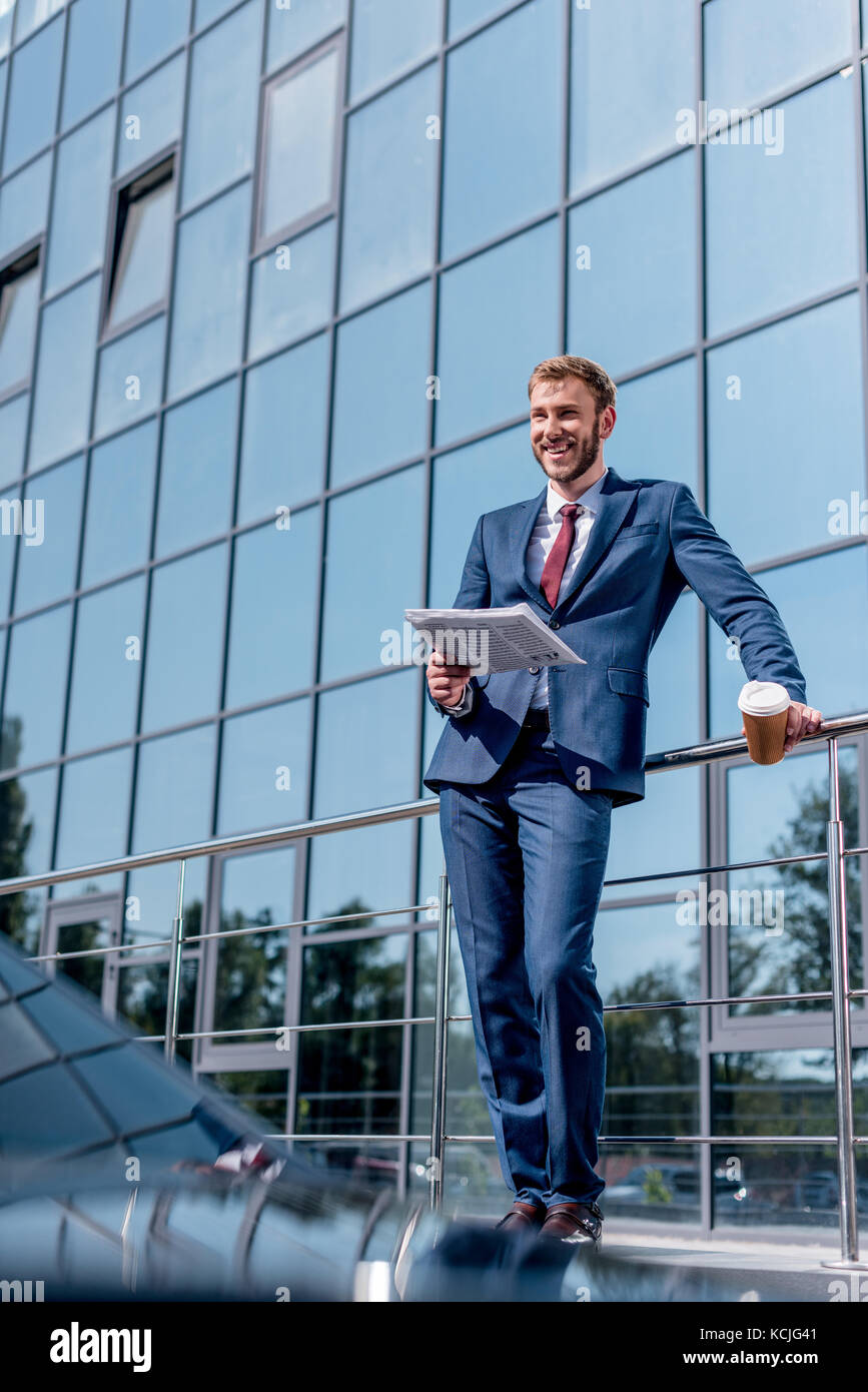 businessman at office building Stock Photo - Alamy