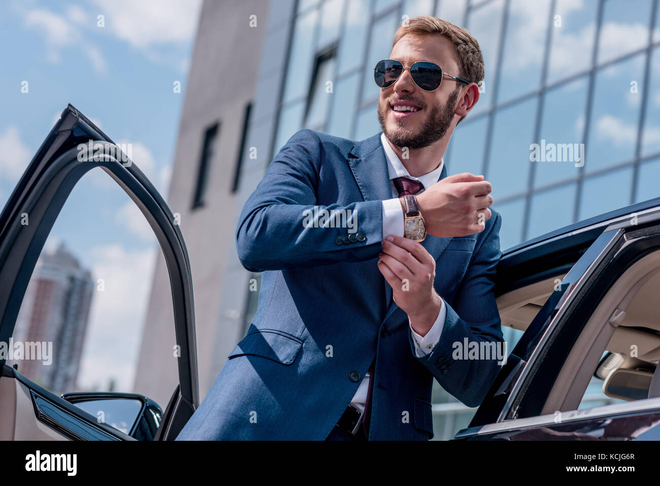 stylish businessman at car Stock Photo - Alamy