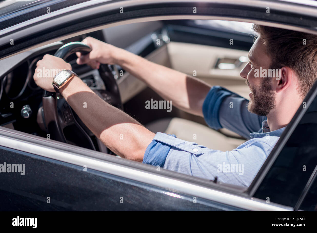 man driving car Stock Photo - Alamy