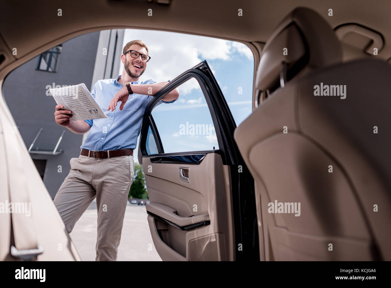 man standing near the car Stock Photo - Alamy
