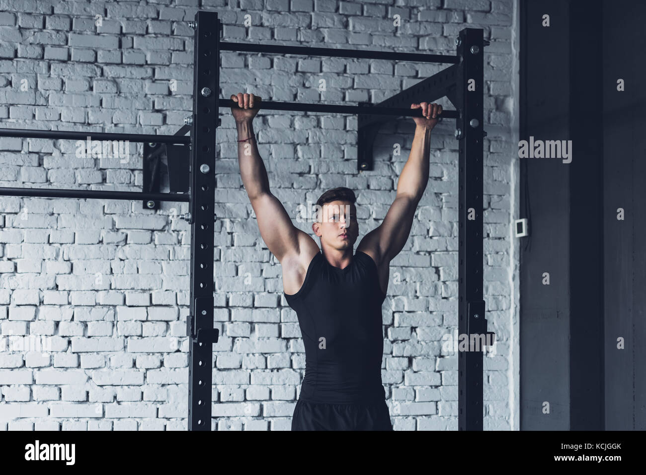 man doing pull ups Stock Photo - Alamy
