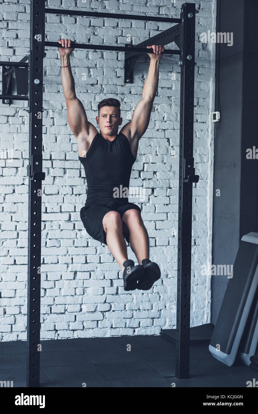 man doing pull ups Stock Photo - Alamy