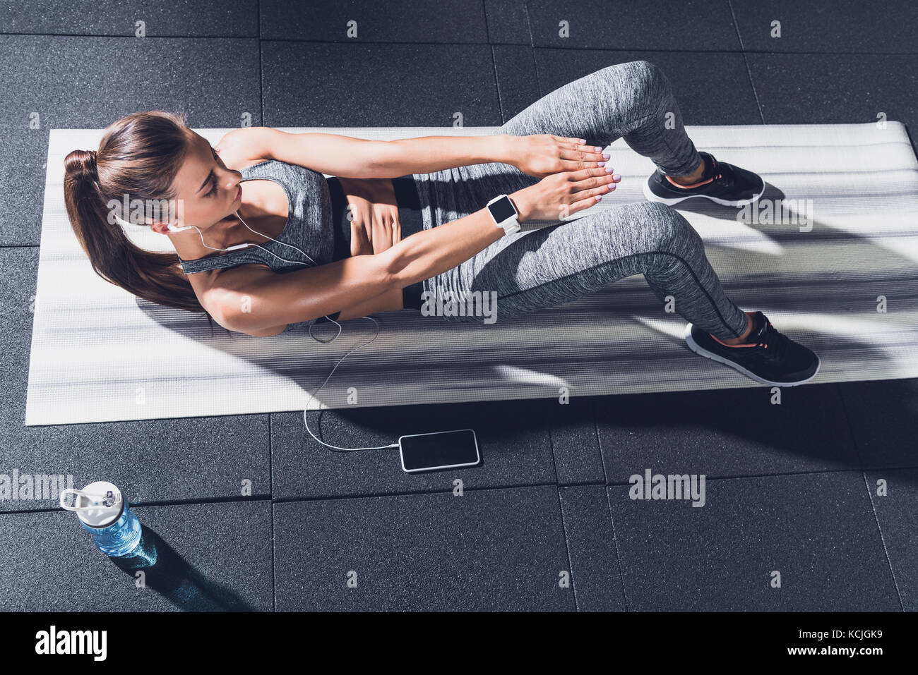 woman doing abs exercises Stock Photo - Alamy