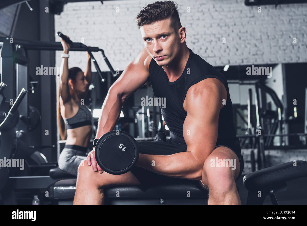 athletic man with barbell Stock Photo - Alamy
