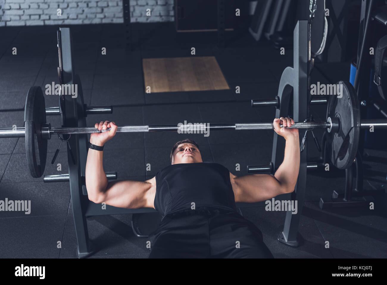 man lifting barbell Stock Photo - Alamy