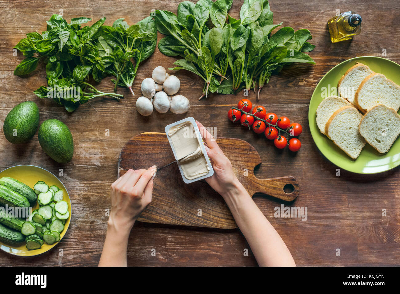 woman holding cream cheese Stock Photo - Alamy