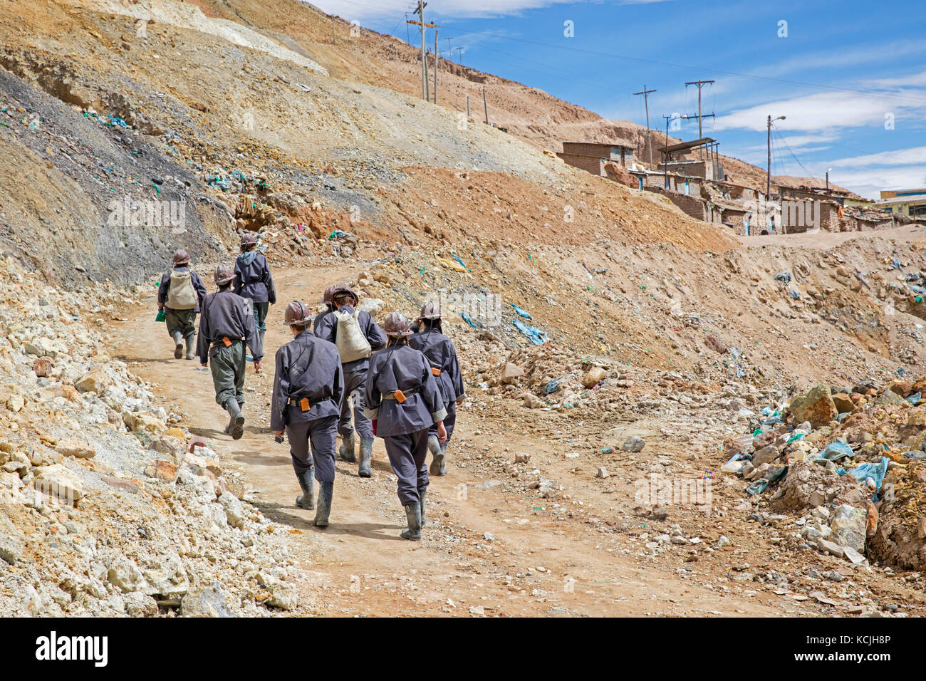 Tourists with guide visiting silver mine on the Cerro Rico de Potosi ...