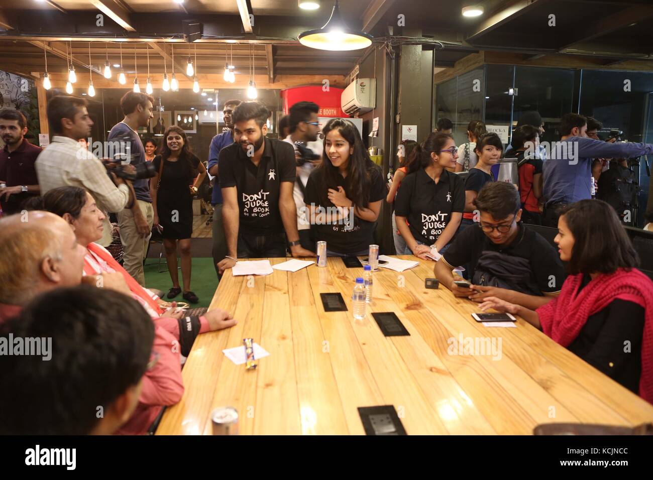 NEW DELHI, INDIA - JUNE 18: Volunteers of the Human Library engage the ...