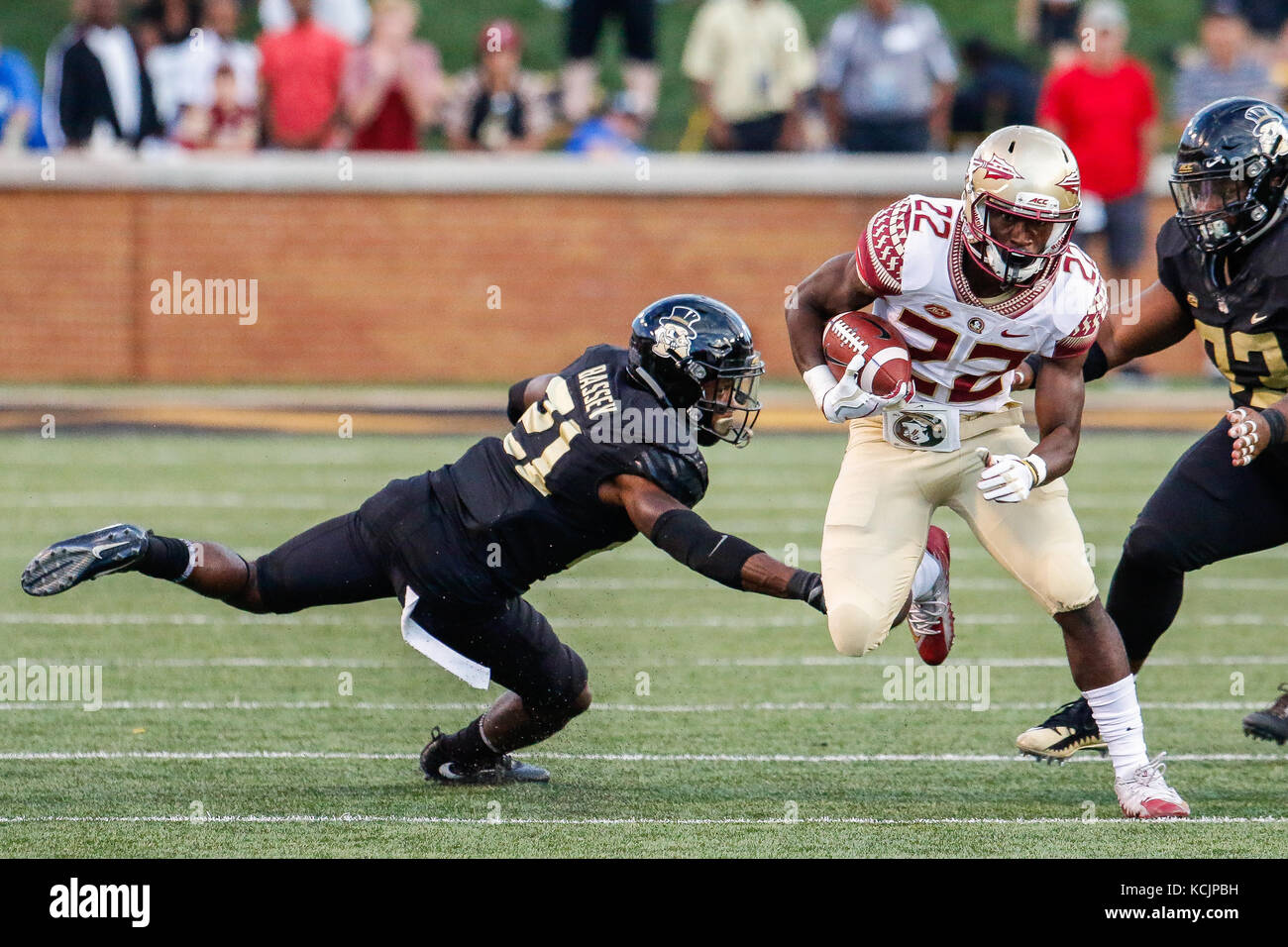 Winston-Salem, NC, USA. 30th Sep, 2017. Essang Bassey (21) of the Wake ...