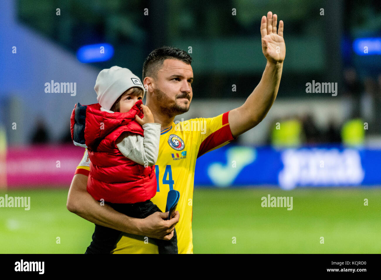 October 5, 2017: Constantin Budescu #14 (Romania) and his child after ...