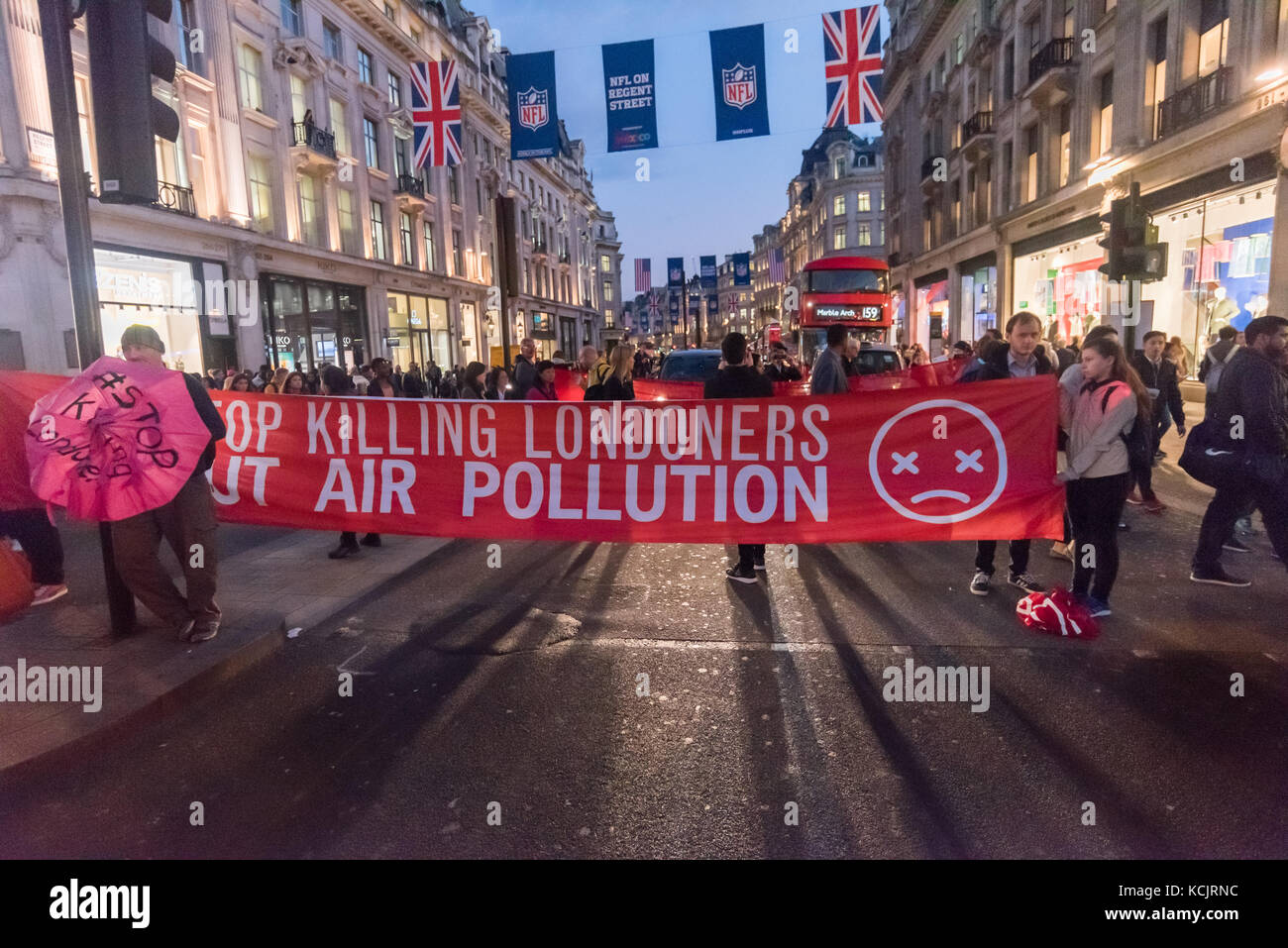 London, UK. 5th October 2017. Campaigners hold banners to block Oxford ...