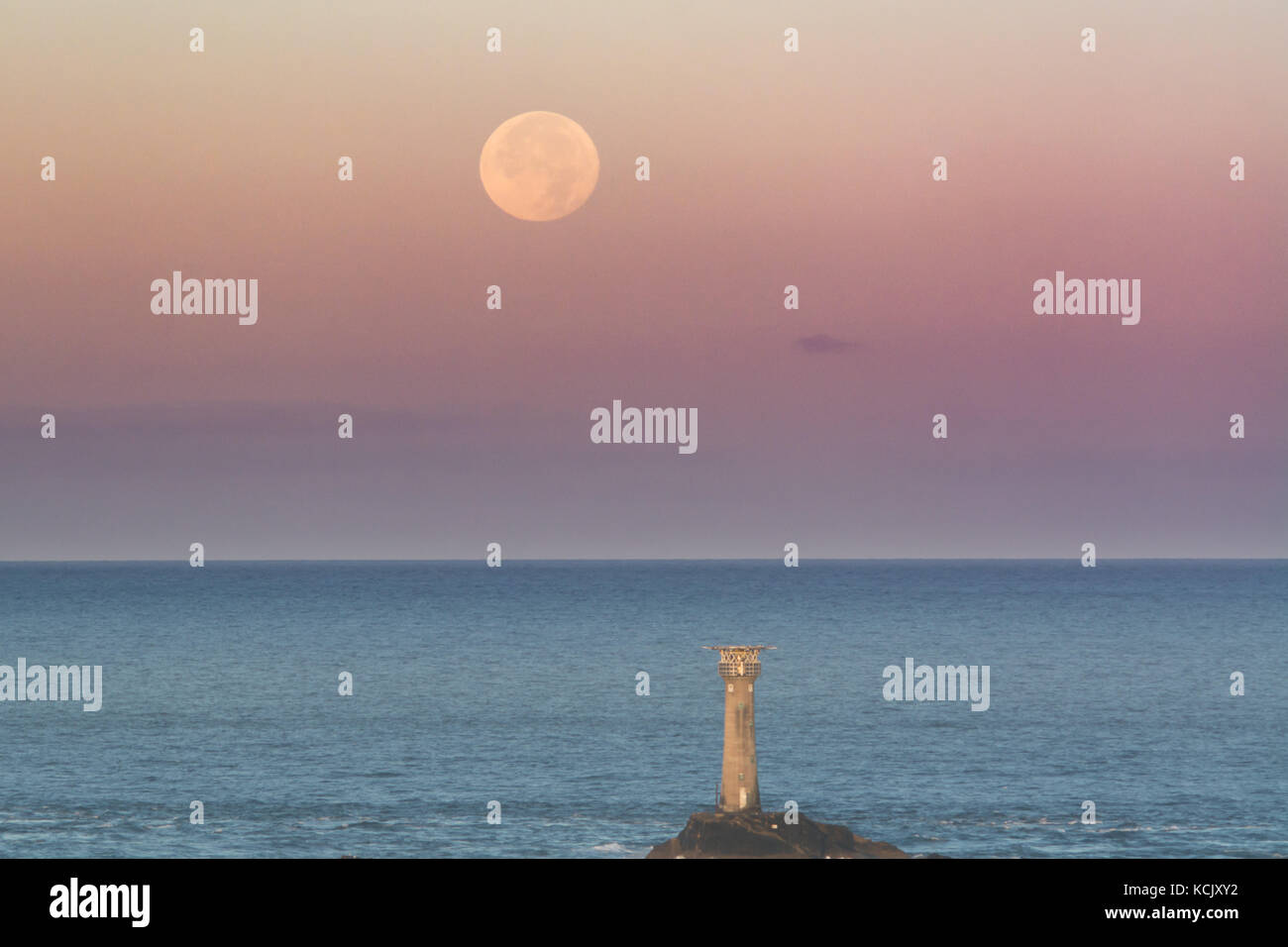 The harvest moon sets hi-res stock photography and images - Alamy