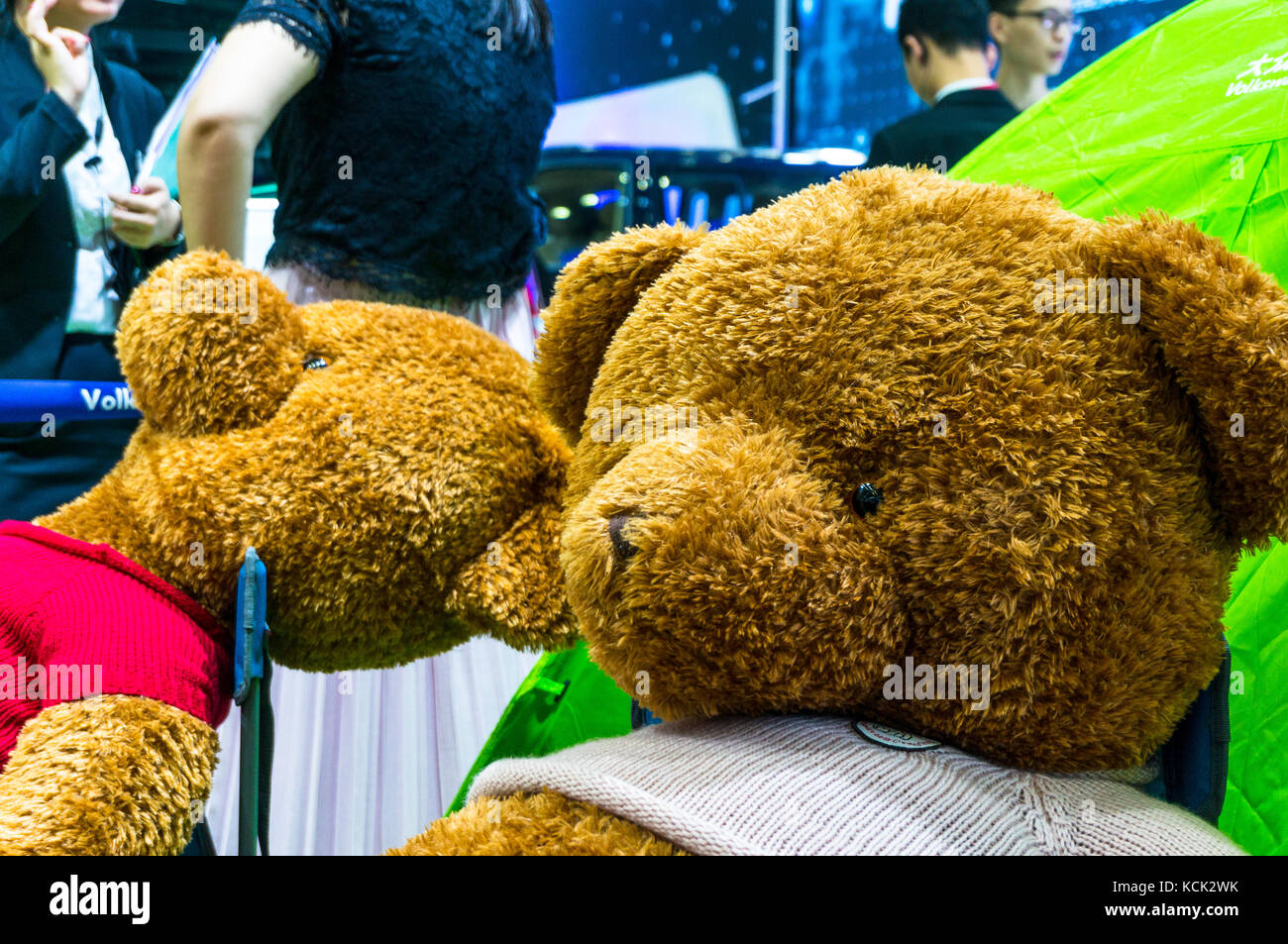 Teddy bears enjoying the show at 2017 Shenzhen Auto Show Stock Photo ...