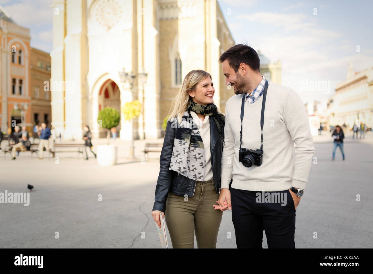 Couple enjoying sightseeing and exploring city Stock Photo - Alamy