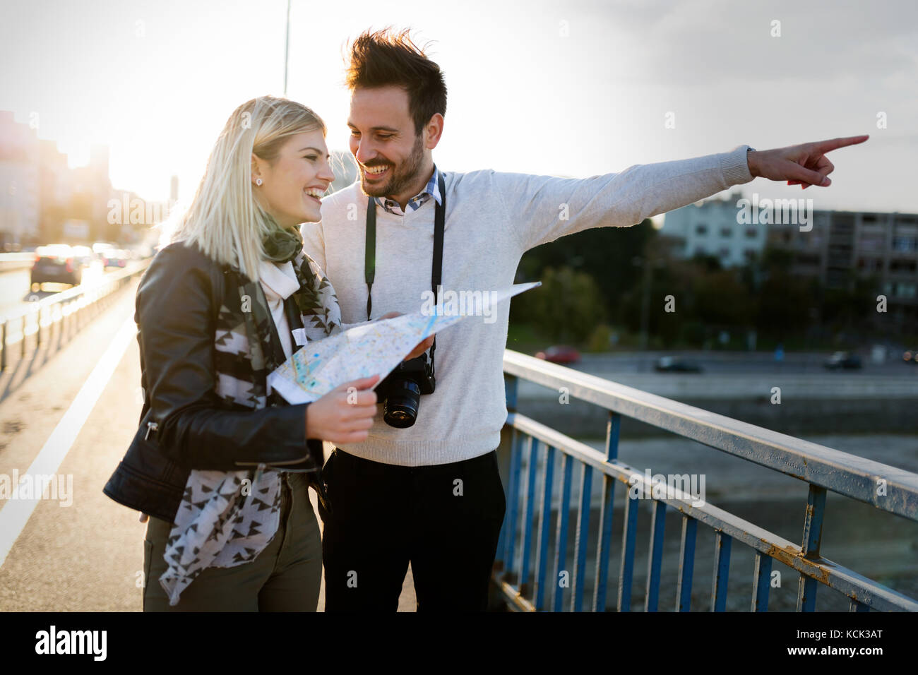 Couple enjoying sightseeing and exploring city Stock Photo - Alamy