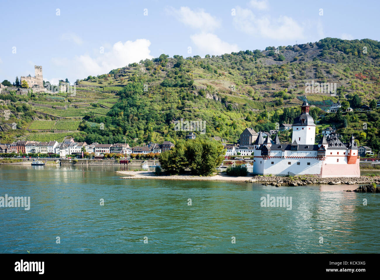 The town of Kaub on the river Rhine in Germany with castle Pfalz in the ...