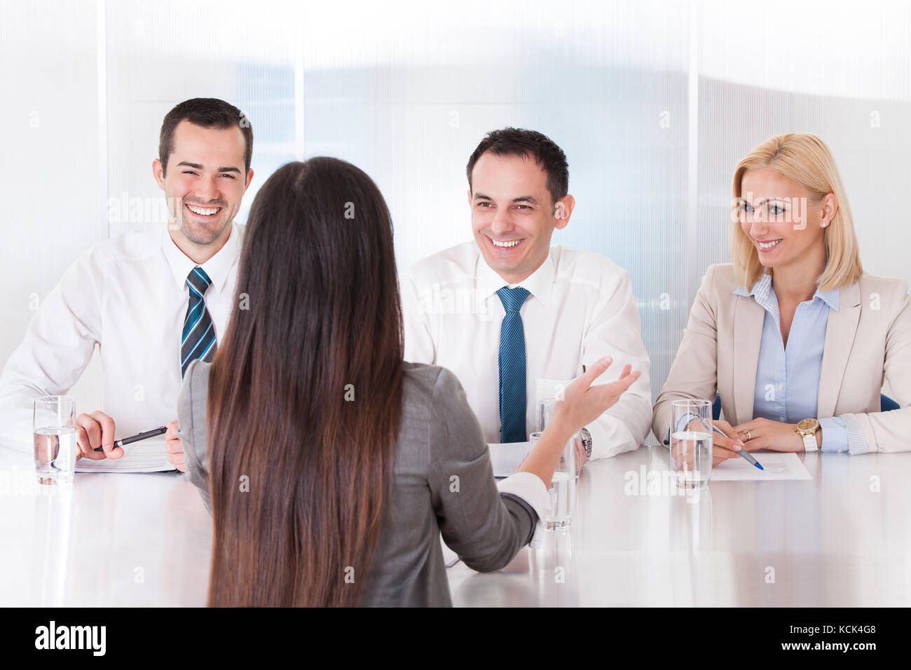 Business Woman Speaking At Interview In Office Stock Photo - Alamy