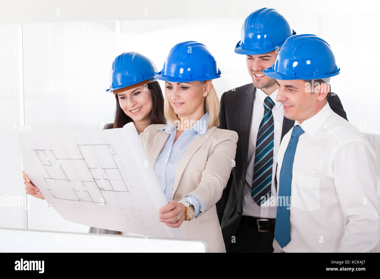 Group Of Architect People Working On Project Stock Photo - Alamy