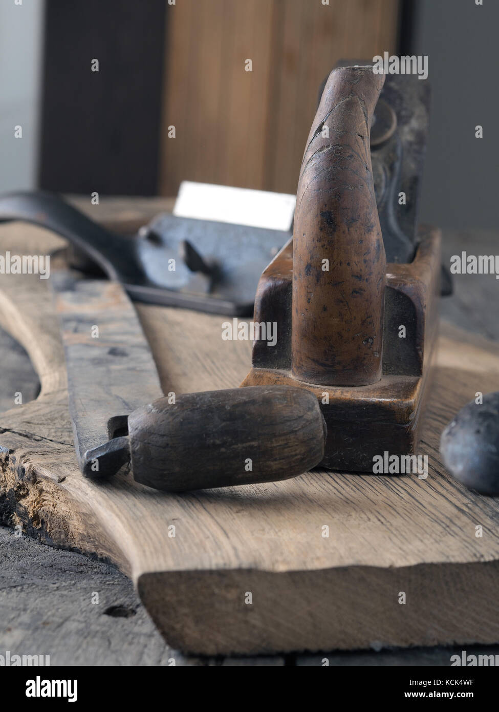 Wood working on an old oak plank, close up shot, joinery or carpentry ...