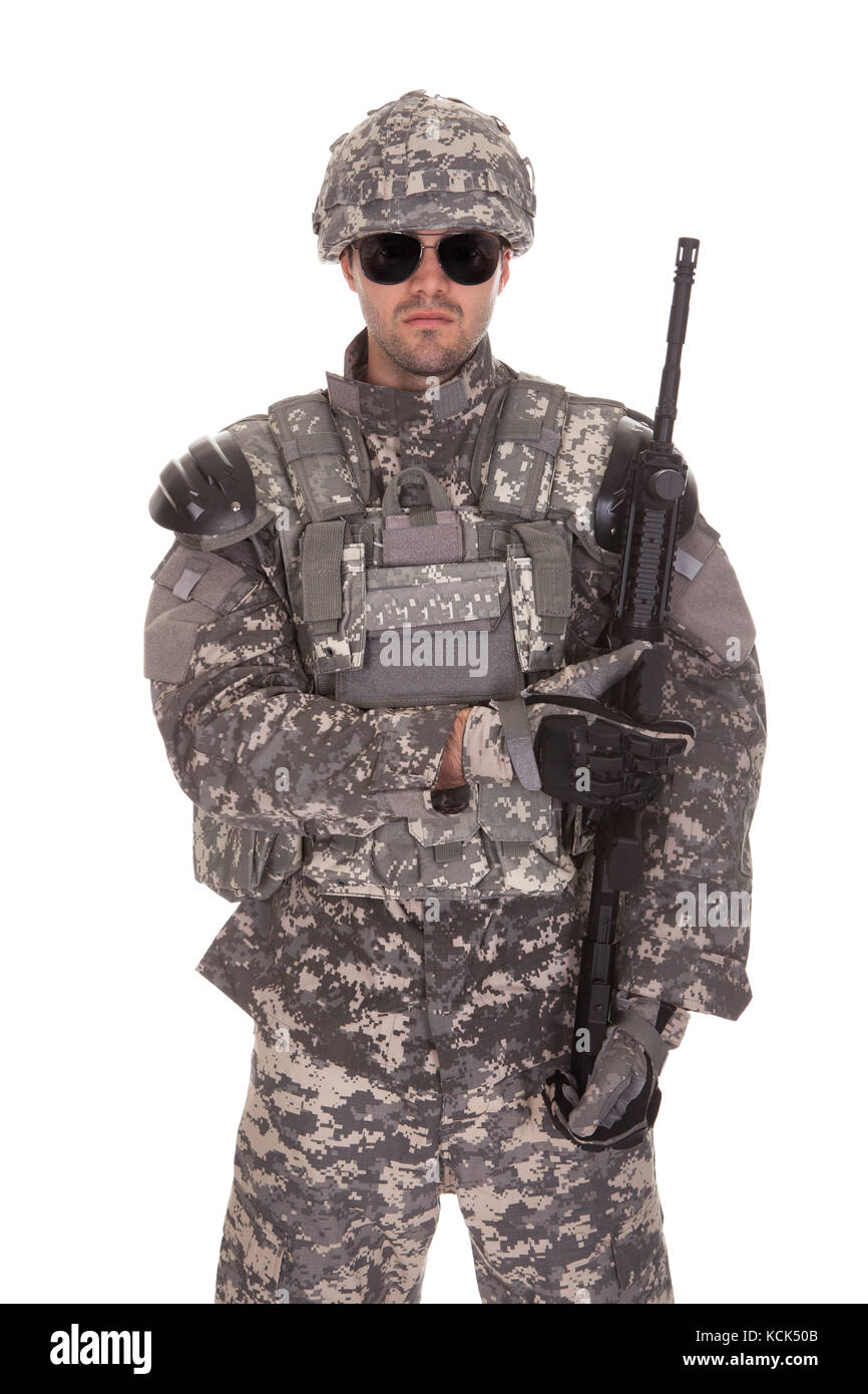 Soldier Holding Rifle Isolated Over White Background Stock Photo - Alamy