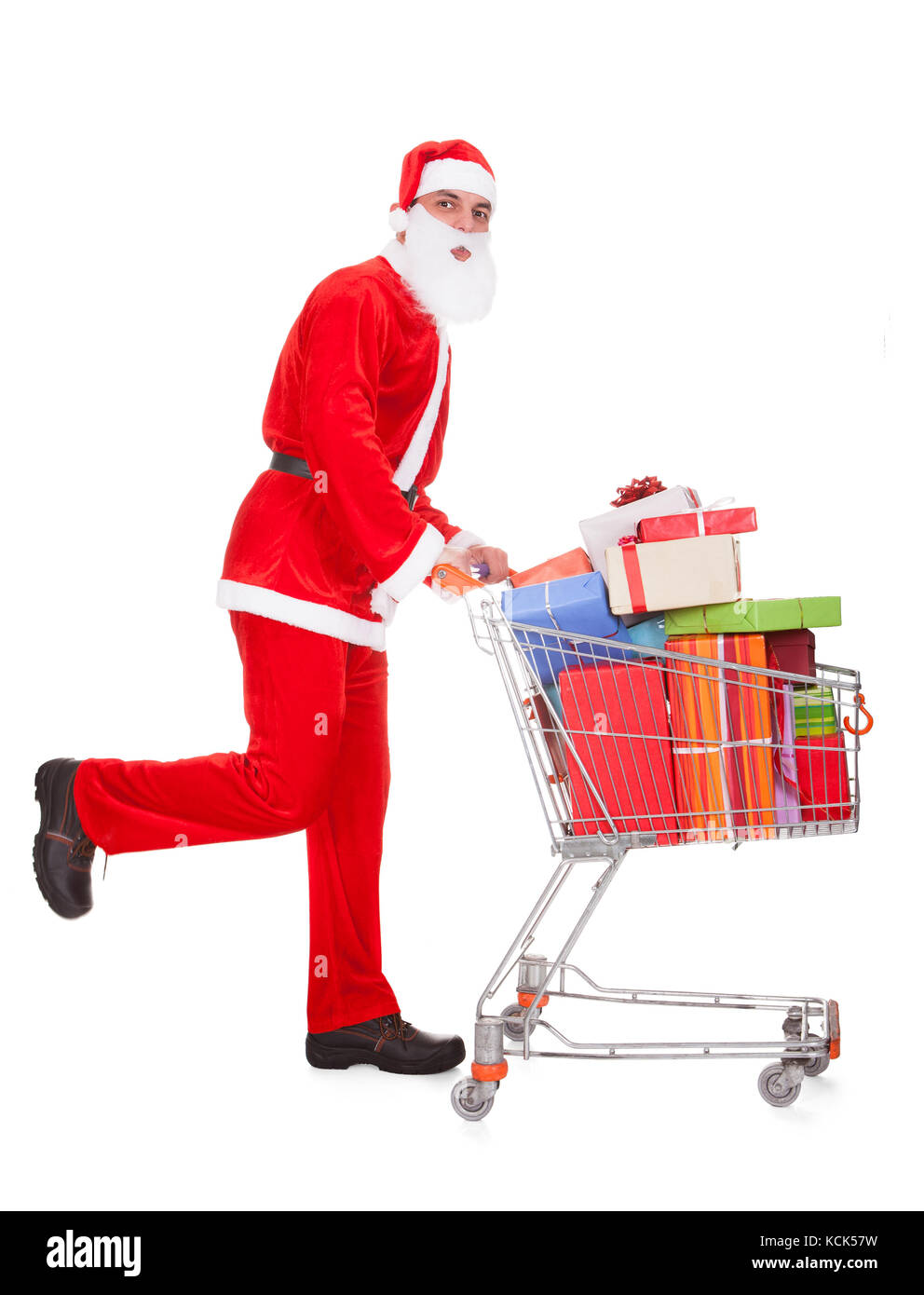 Santa Holding Shopping Cart On White Background Stock Photo - Alamy