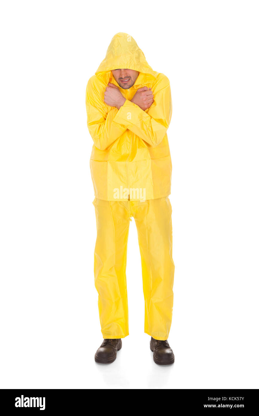 Man wearing raincoat hi-res stock photography and images - Alamy