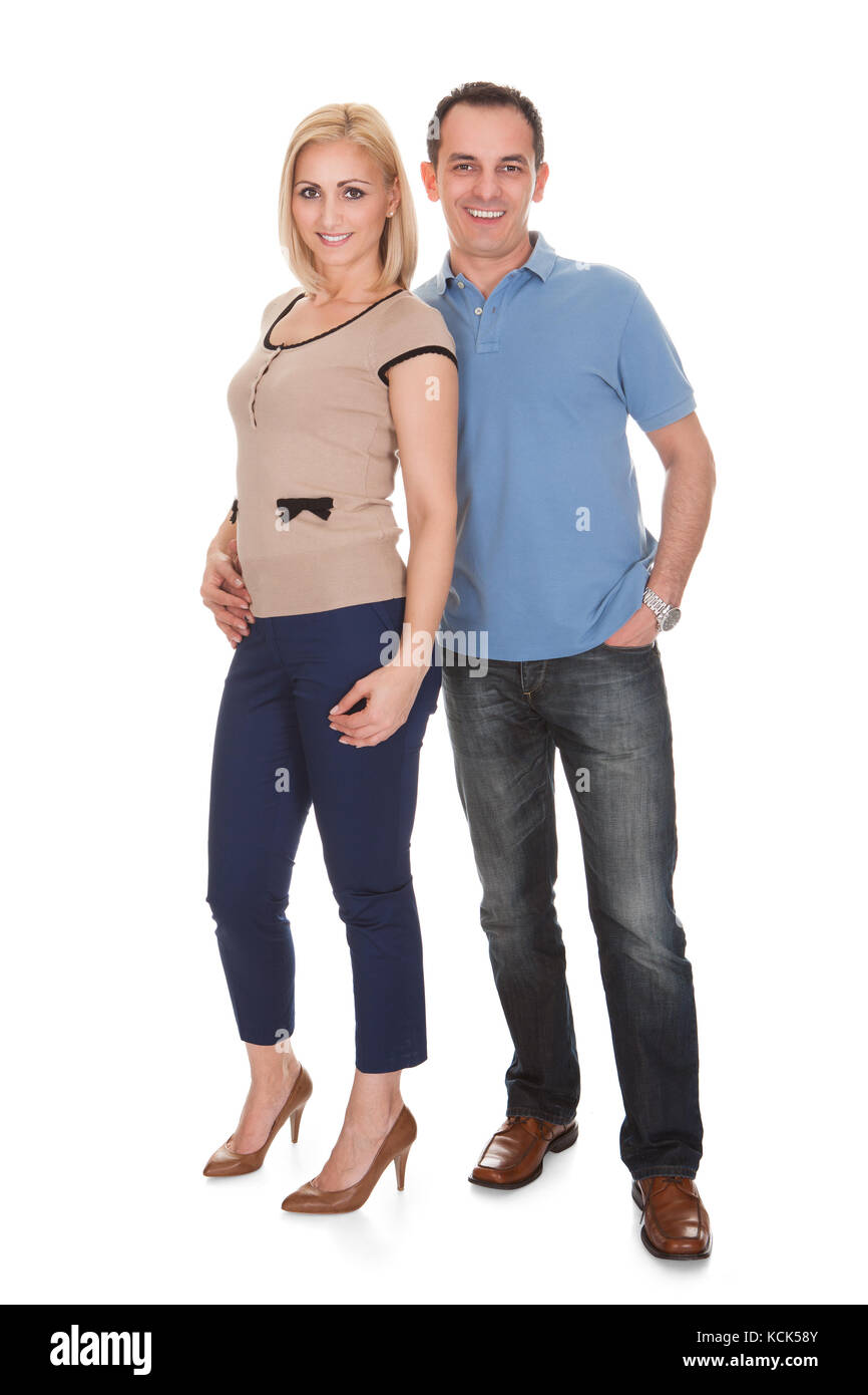 Portrait Of Happy Couple On White Background Stock Photo - Alamy