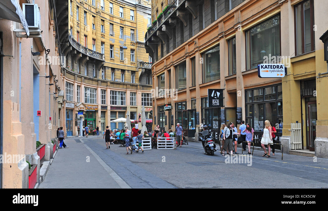 BUDAPEST - MAY 28: People goes by the street in Budapest downtown on ...