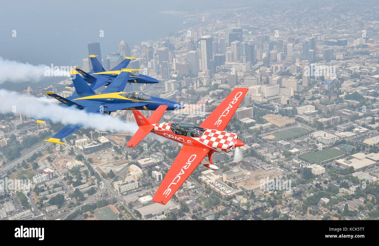 Two U.S. Navy Blue Angels flight demonstration aircraft fly in ...