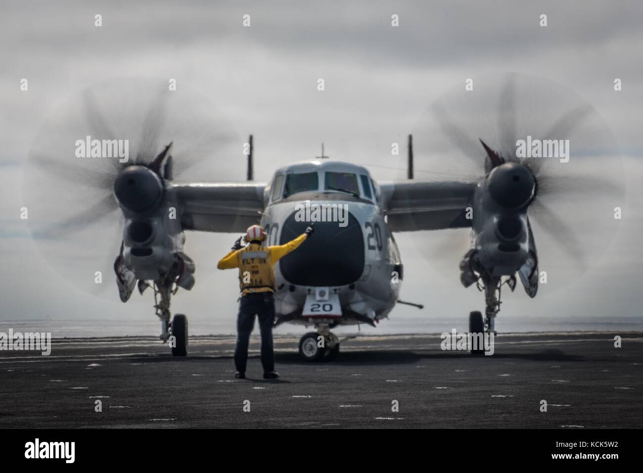 A U.S. Navy C-2A Greyhound cargo aircraft launches from the flight deck ...