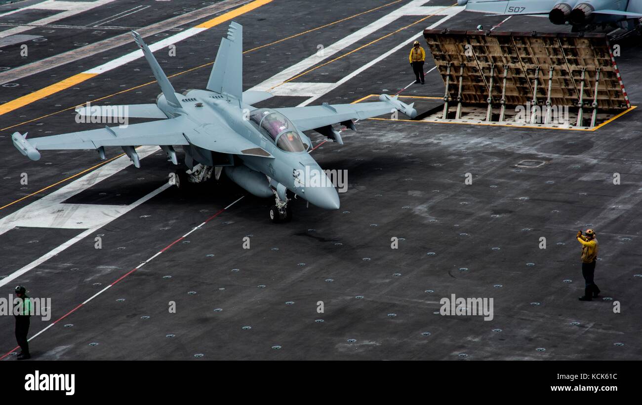 A U.S. Navy EA-18G Growler airborne electronic attack aircraft taxies ...