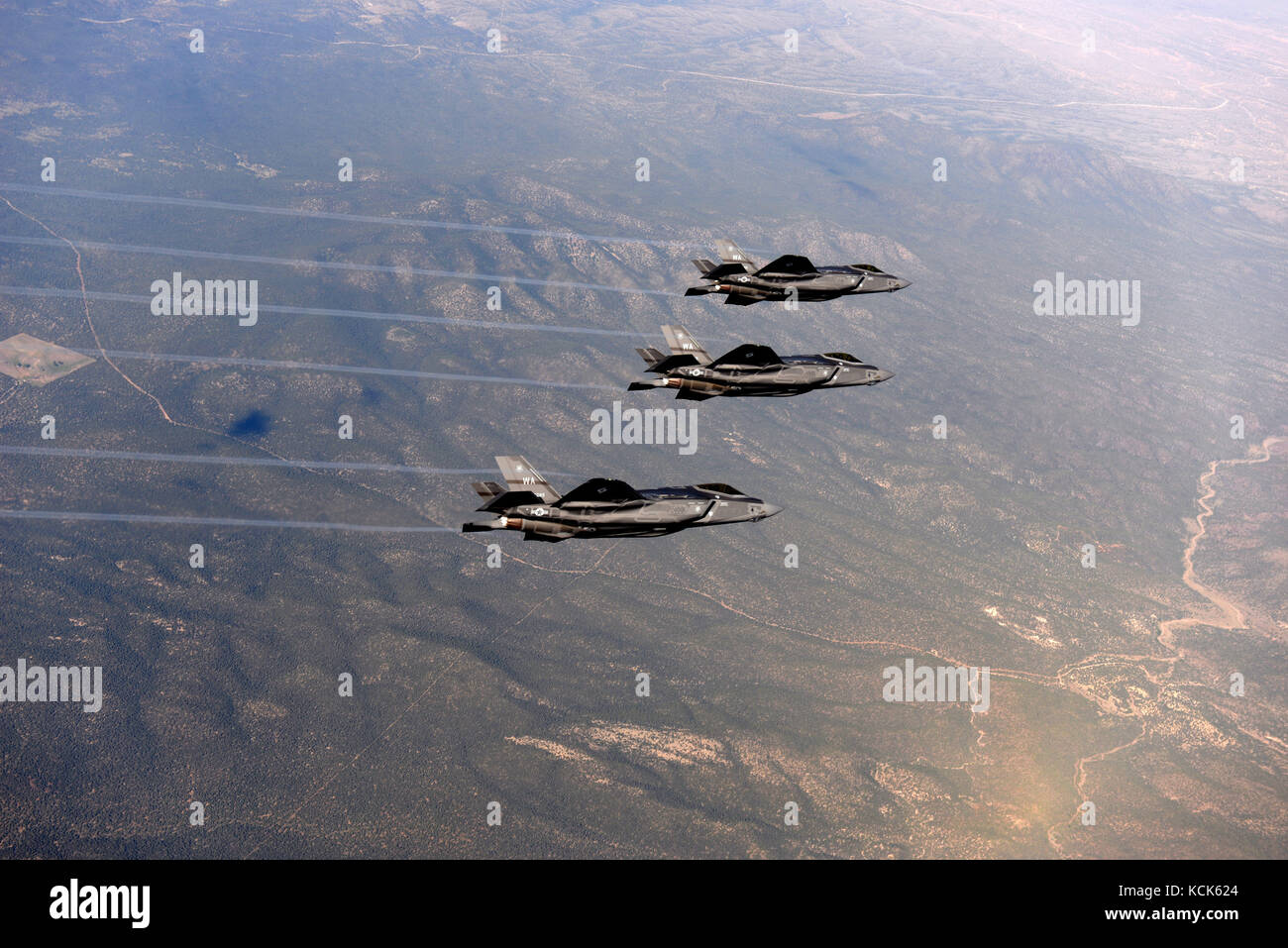U.S. Air Force F-35 Lightning II stealth fighter aircraft fly in ...