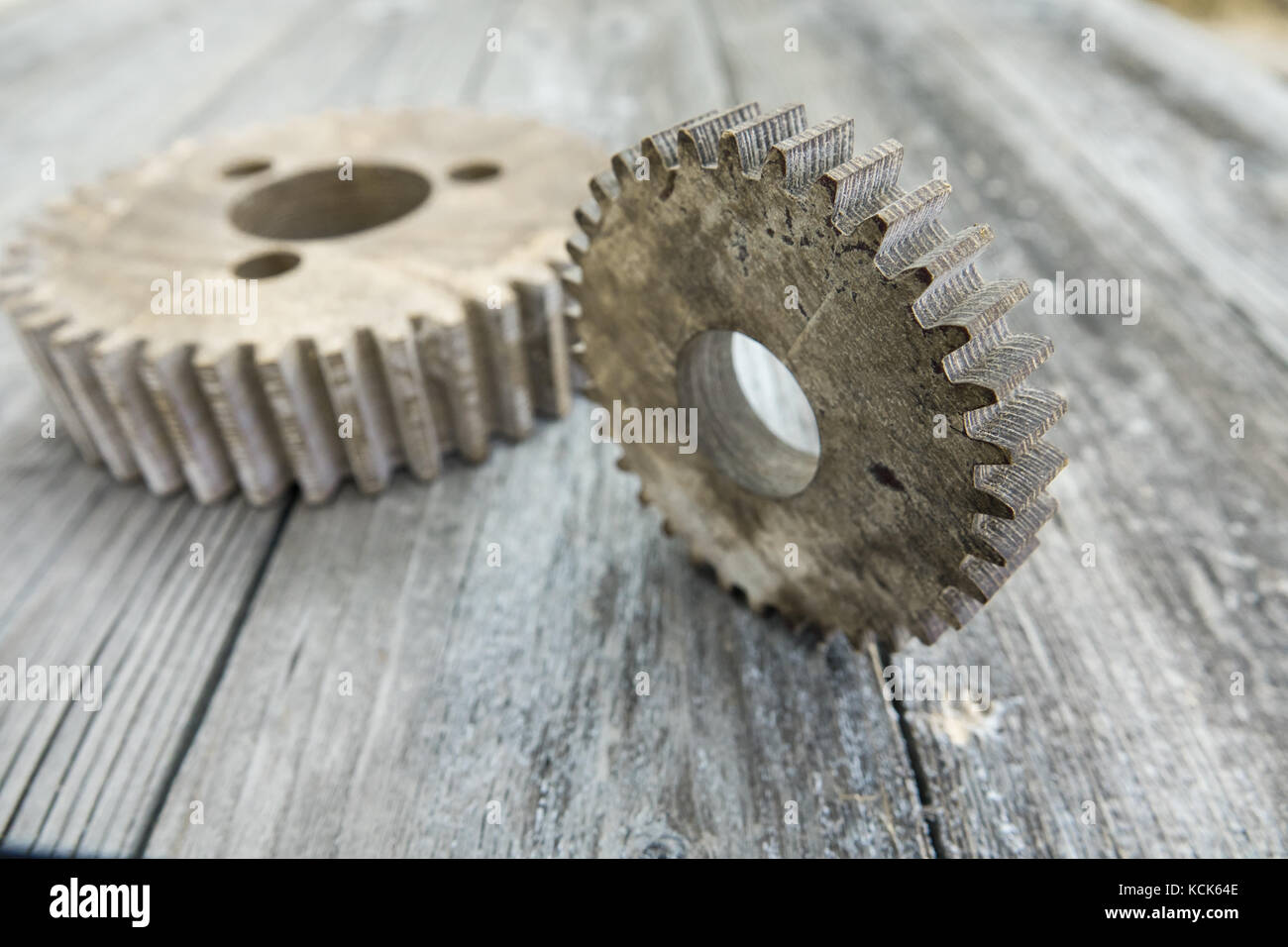 Wooden toothed wheels. The concept of creative and logical thinking ...