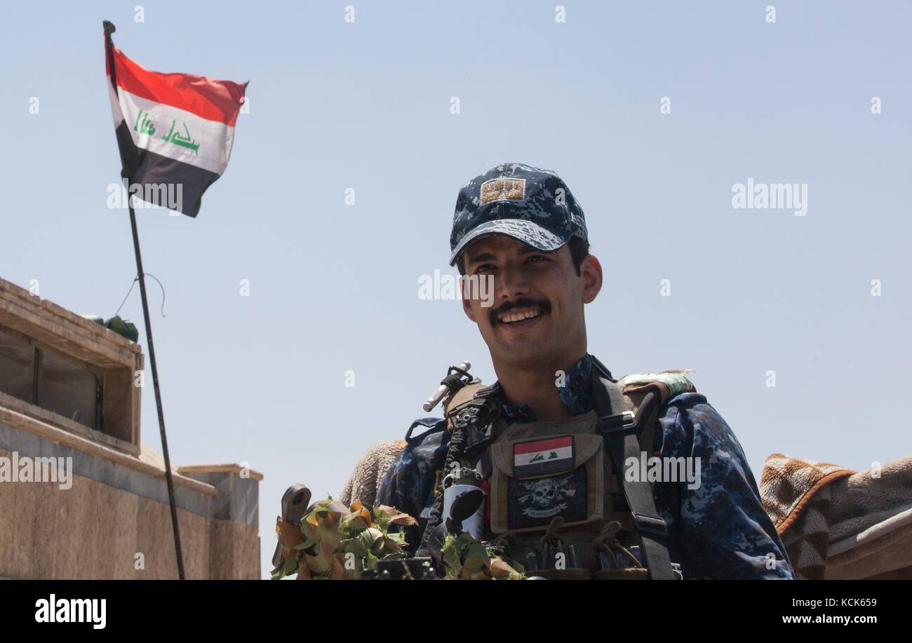 An Iraqi Federal Police officer guards a Federal Police patrol base ...