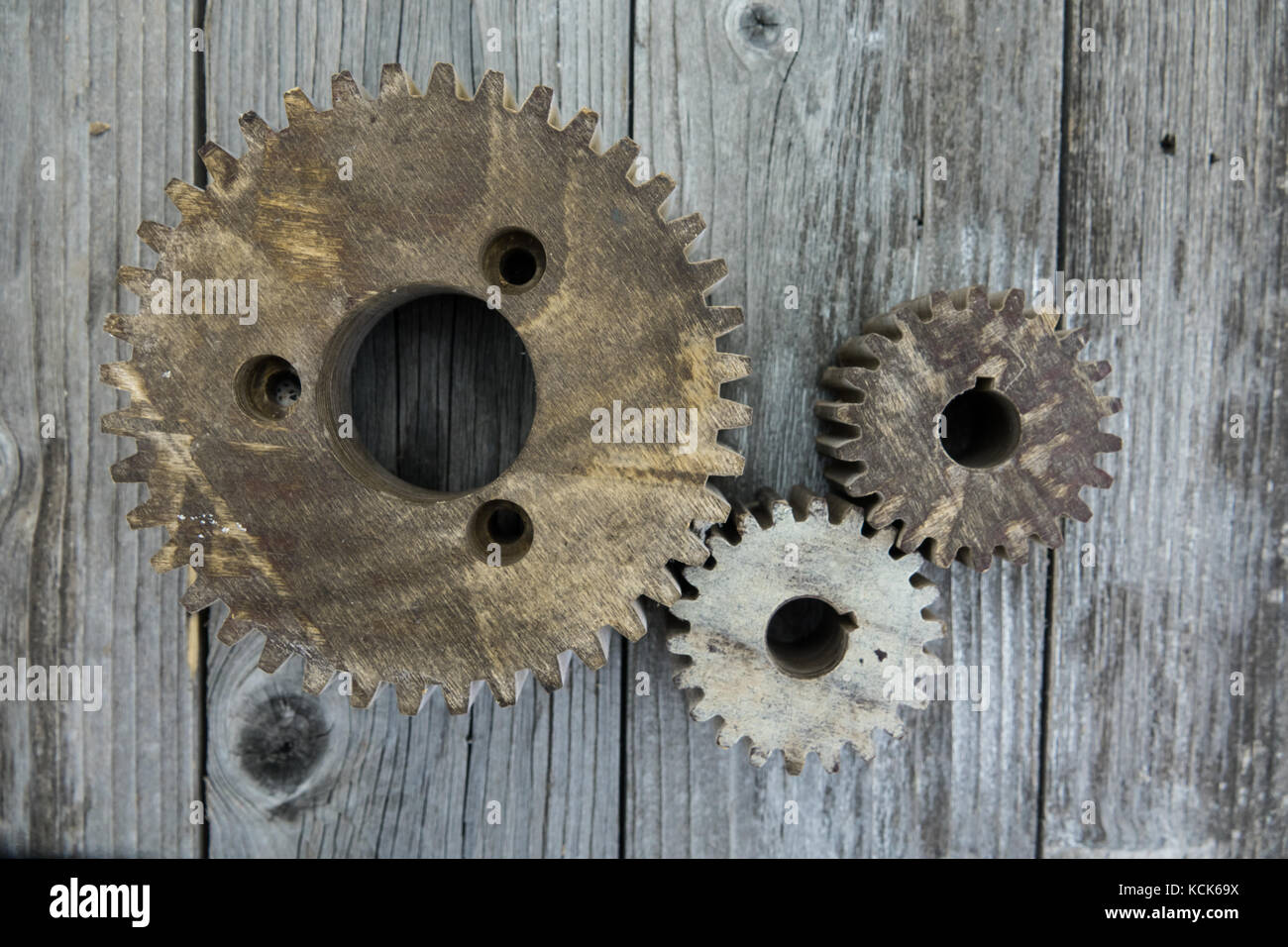 Wooden toothed wheels. The concept of creative and logical thinking ...