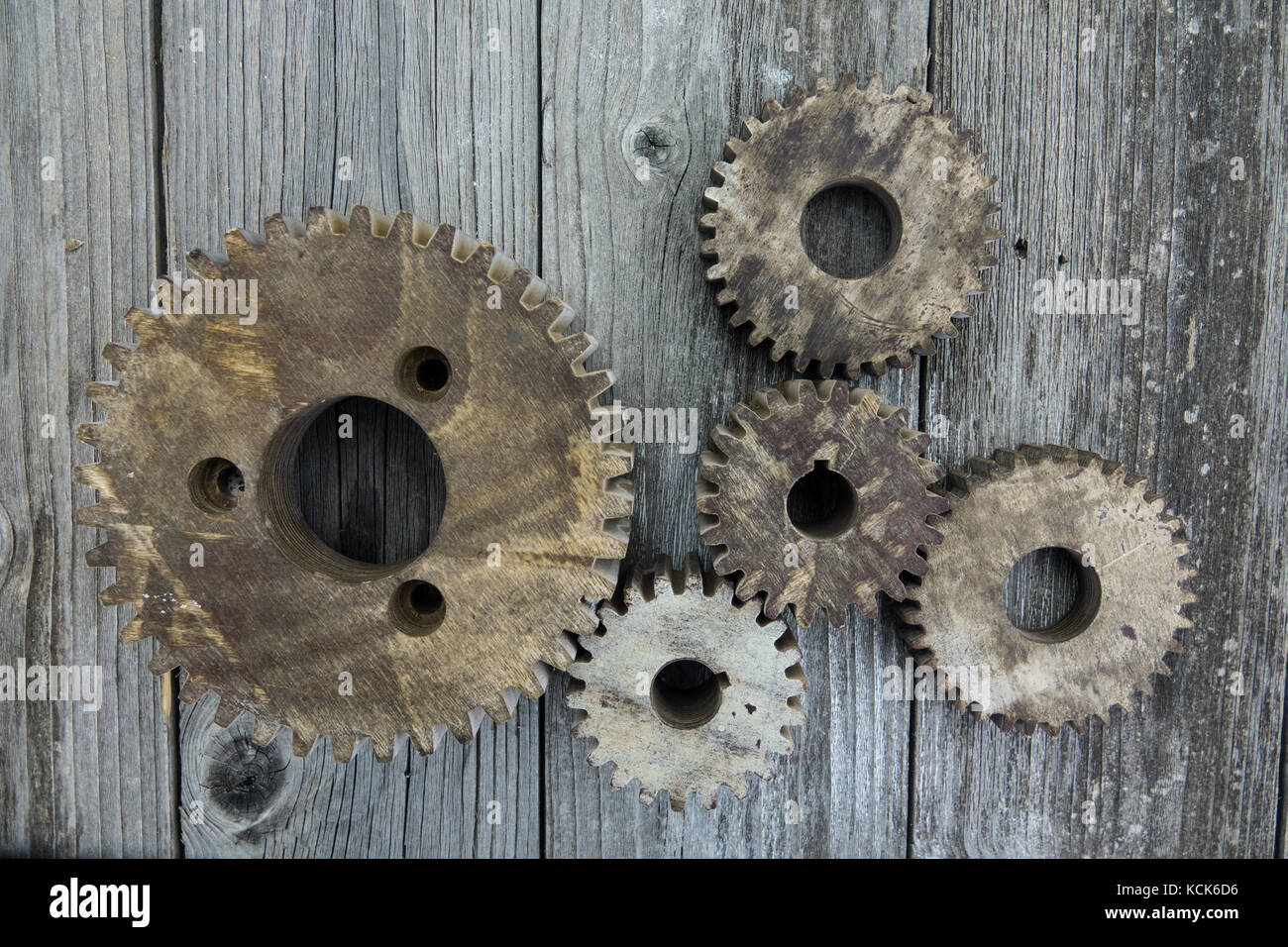 Wooden toothed wheels. The concept of creative and logical thinking ...